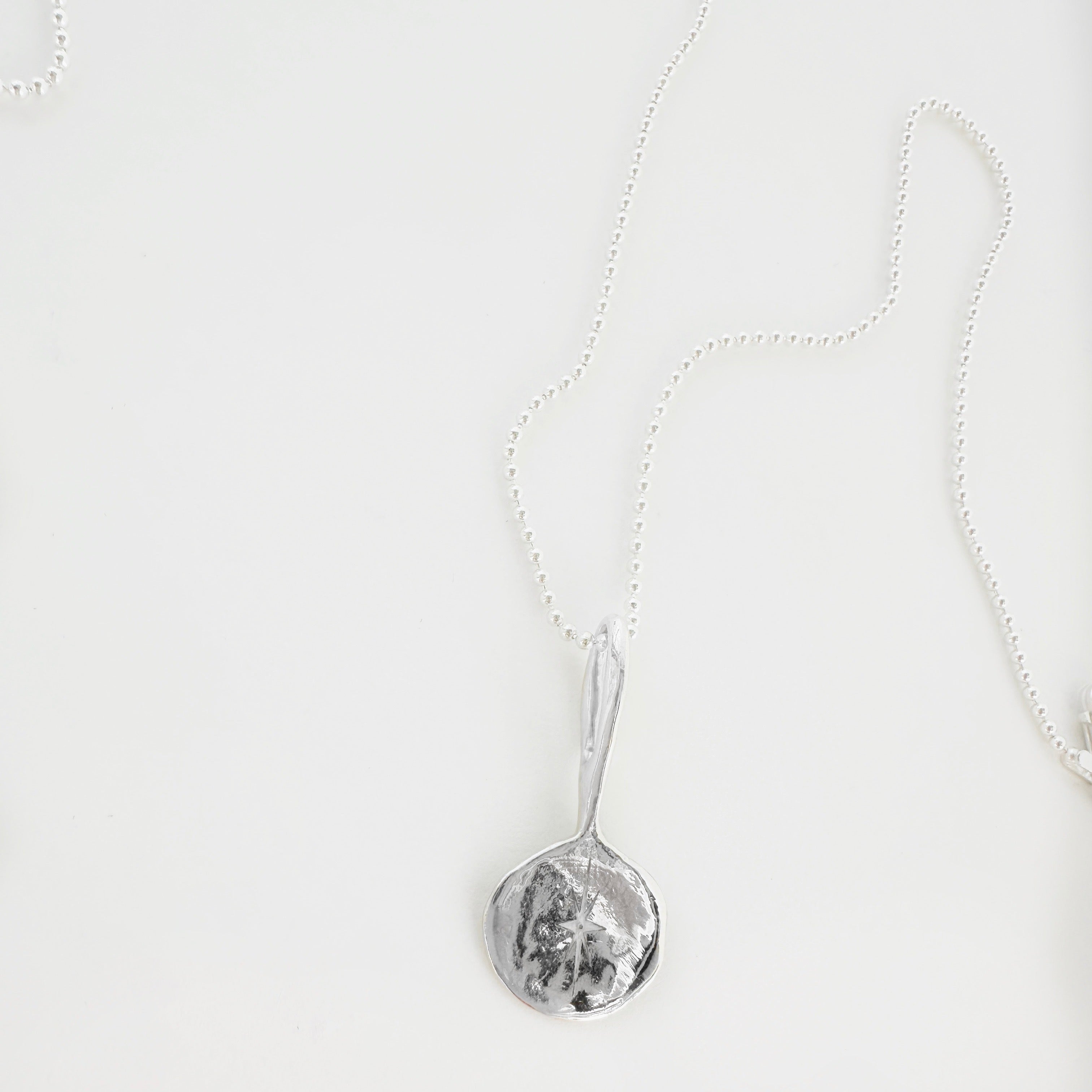 North Star Round Silver Necklace – Rebecca Pinto